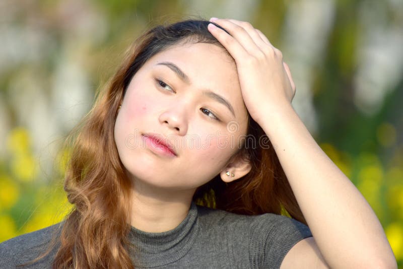 A Forgetful Female Woman stock image. Image of adult - 141769907