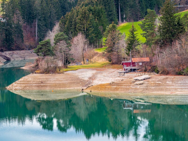 Forggensee with forests stock photo. Image of mountain - 205649134