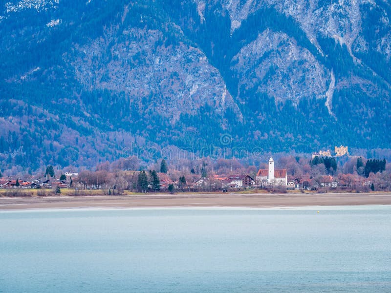 Forggensee with mountains stock photo. Image of schwangau - 205563488