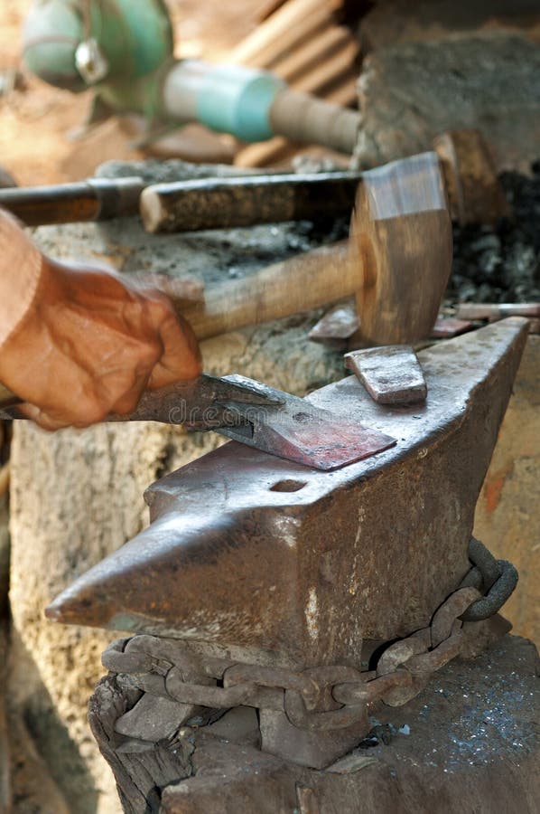 Forging a hammer head stock image. Image of glow, smithy - 28725619