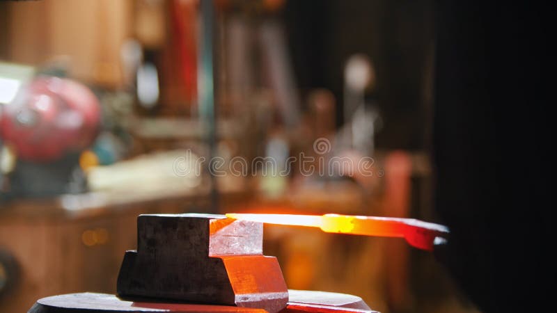 Forging an Object Out of Hot Metal Using a Pressure Machine Stock Image ...