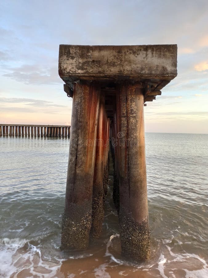 Forgotten Pier Column Under Beatiful Skies Stock Photo - Image of shore ...