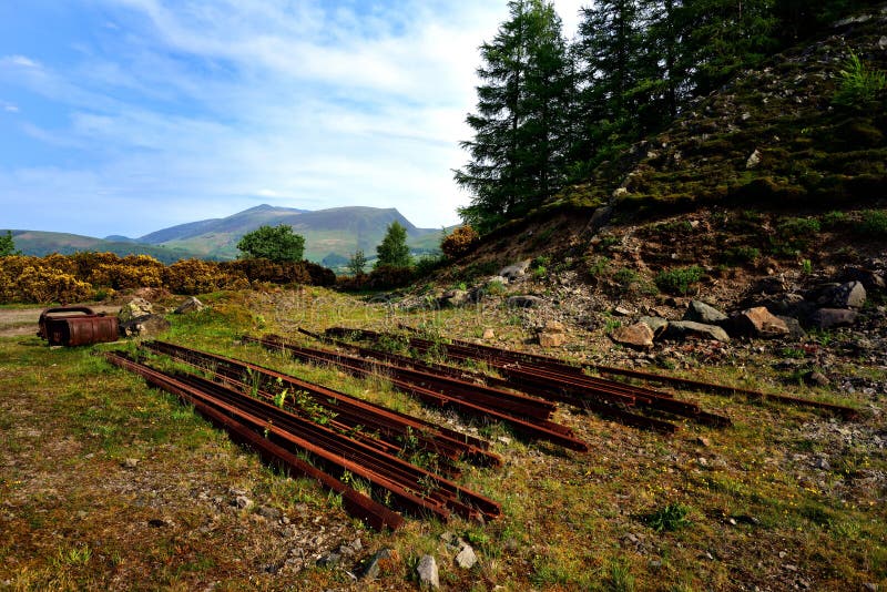 Rusting Railway Track and Bucket Stock Image - Image of lines, brown ...