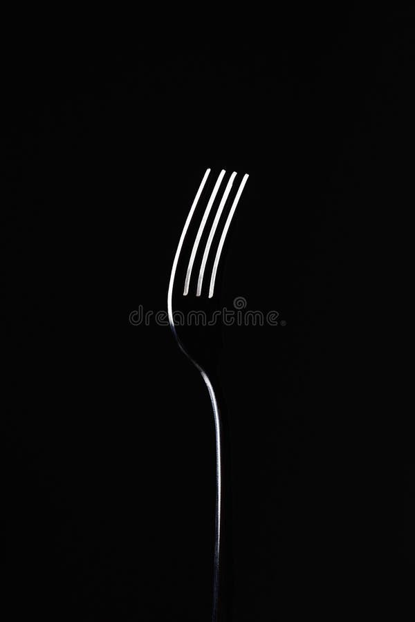 Fork on Black Background. Abstract Minimalist Composition Stock Image ...
