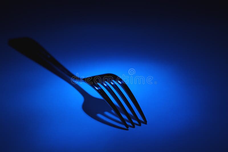 Fork in blue stock photo. Image of colored, focus, elegant - 17885048