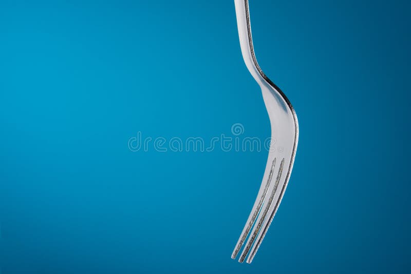 Fork in Blue Background in Studio Stock Image - Image of lunch, dark ...