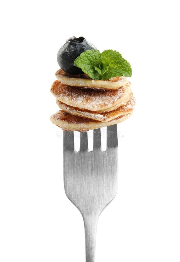 Fork with Cereal Pancakes, Blueberry and Mint on White Background Stock ...