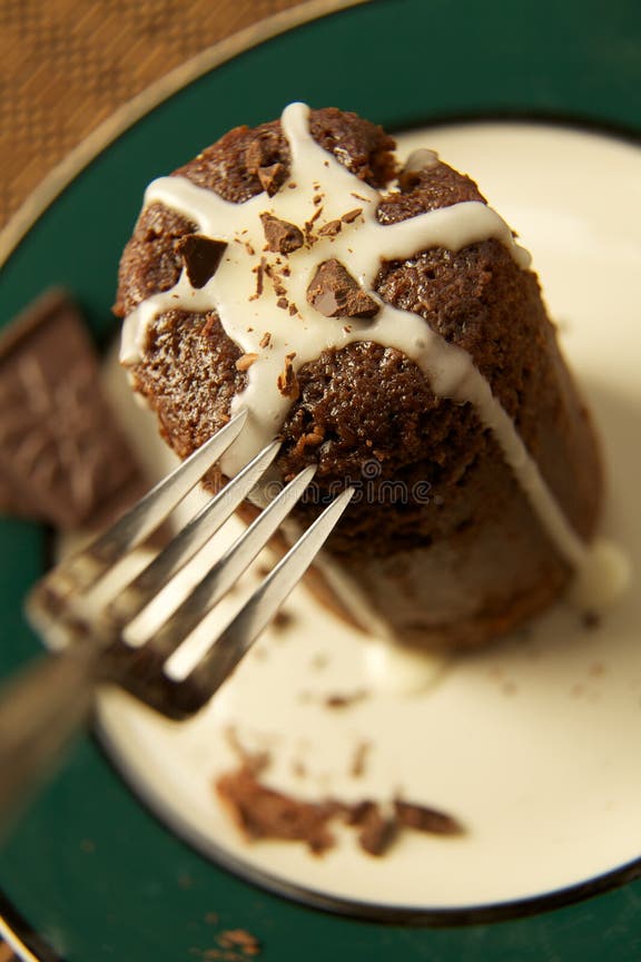 Fork digging into cake stock photo. Image of temptation - 29076240