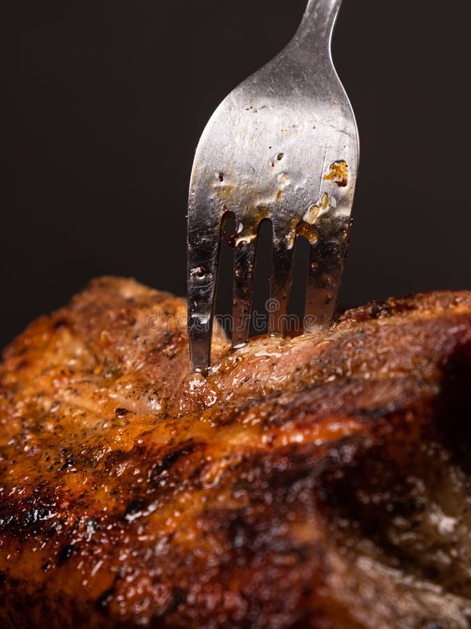 Fork in a Fried Piece of Meat, Juicy Pork Closeup Stock Photo - Image ...