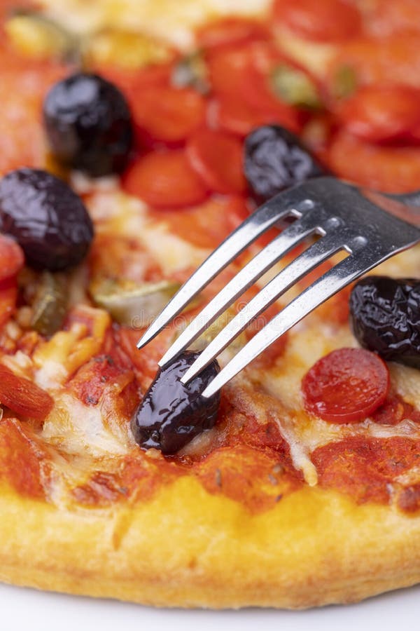 Pizza on the fork. stock photo. Image of food, cheese - 13272088