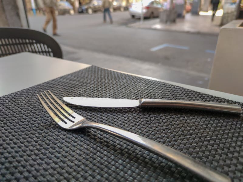 A Fork and a Knife in a Restaurant Table Stock Photo - Image of lunch ...
