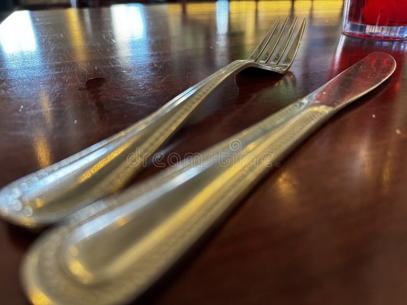 Fork and Knife Silverware on Table with Reflections Stock Image - Image ...