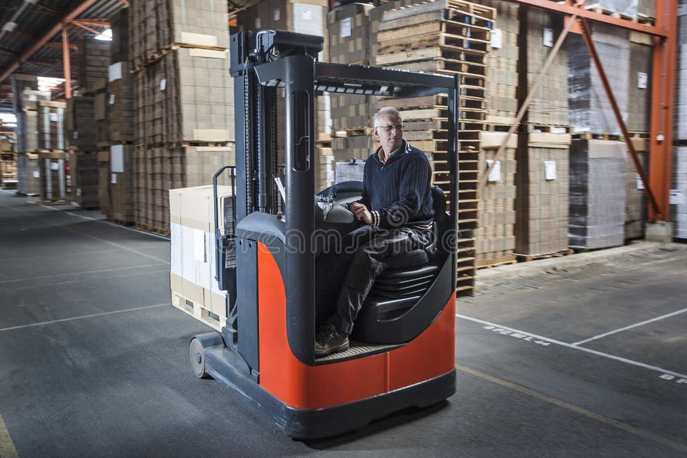 Fork Lift Operator Preparing Products for Shipment Stock Photo - Image ...