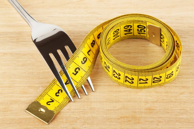 Fork with measuring tape stock photo. Image of body, balance - 22806844