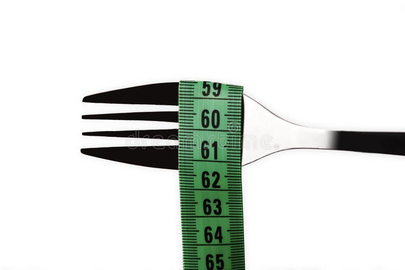 Fork with measuring tape stock photo. Image of fork, flatware - 38486560