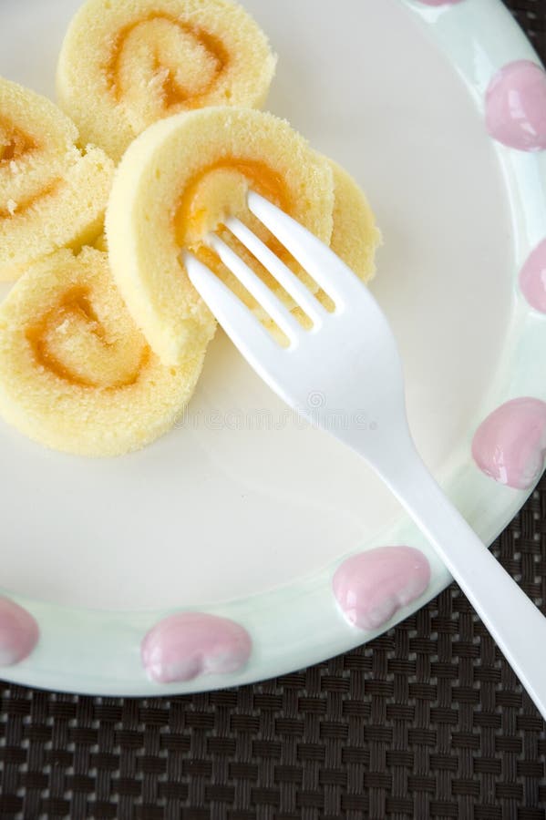 Fork on orange jam roll stock image. Image of slice, detail - 36836759