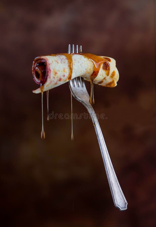Fork and pancake droplet stock image. Image of delicious - 232998461