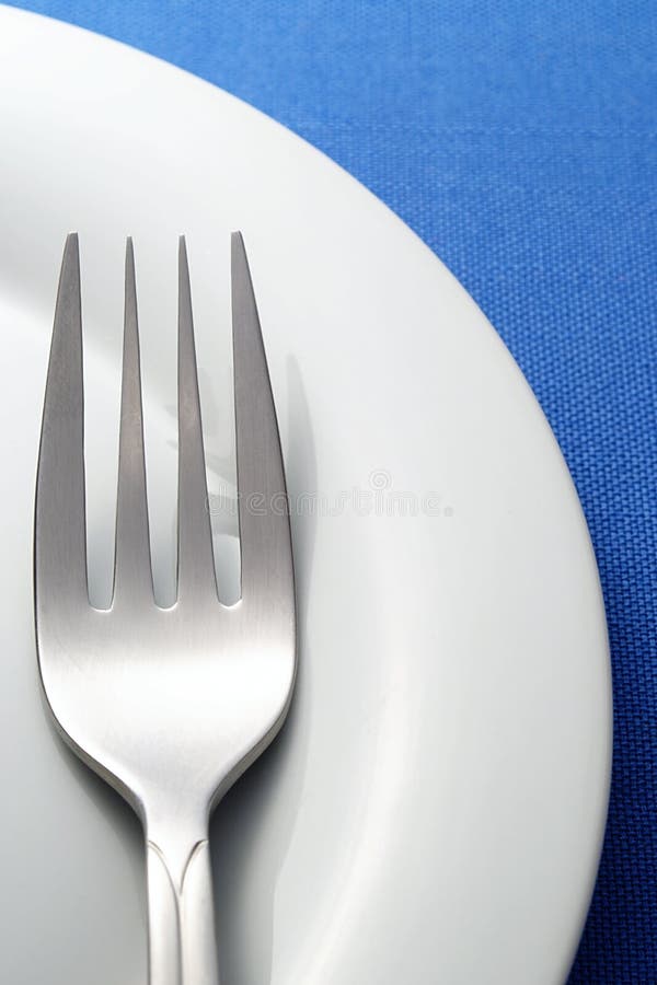 Fork and a plate stock image. Image of group, dining - 23628557