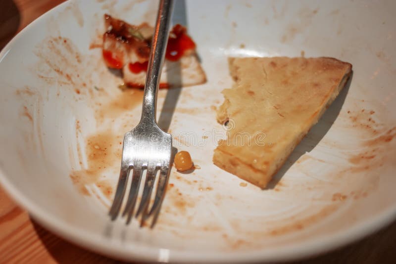 Fork on Plate with Half Eaten Pizza Stock Image - Image of meal, brown ...
