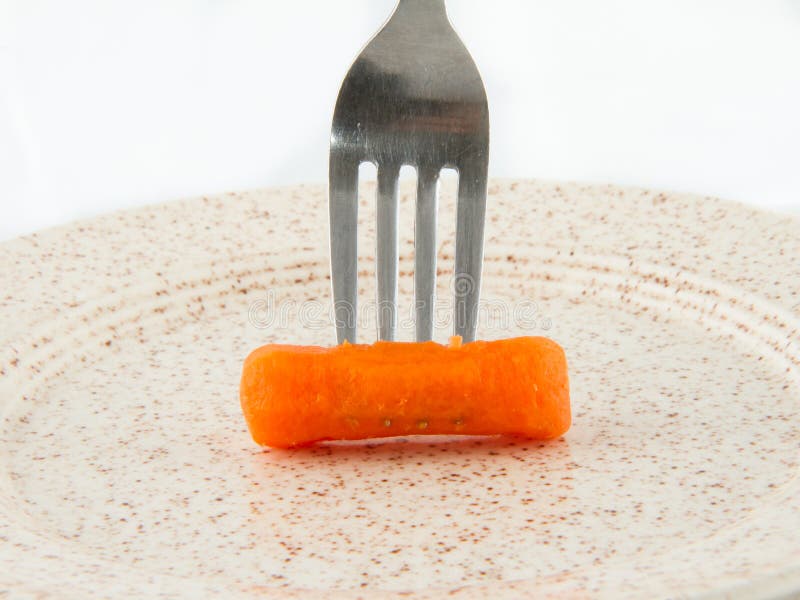 Fork Poking through a Carrot Stock Image - Image of gourmet, metal ...