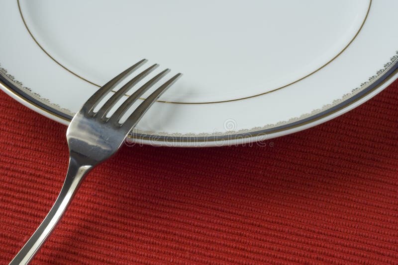 Fork and porcelain plate stock image. Image of flatware - 4082015