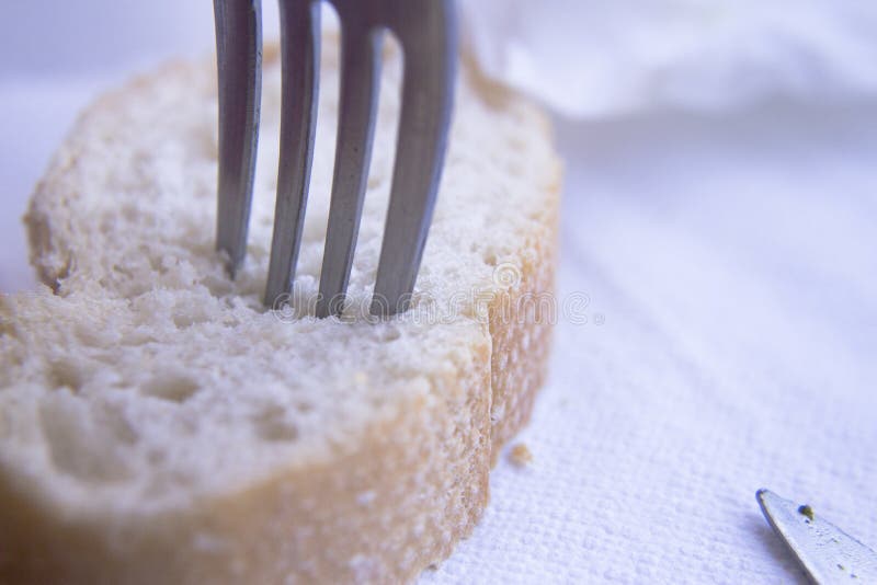 Fork Pricking a Piece of Bread Stock Image - Image of bread, color ...