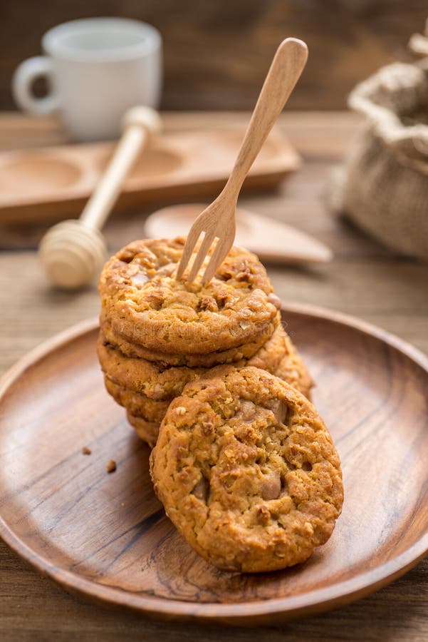 Fork Put on Stacked Cookies and Wood Dish Stock Image - Image of stack ...