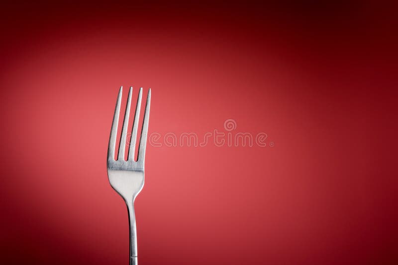 Fork in Red Background in Studio Stock Photo - Image of colored ...