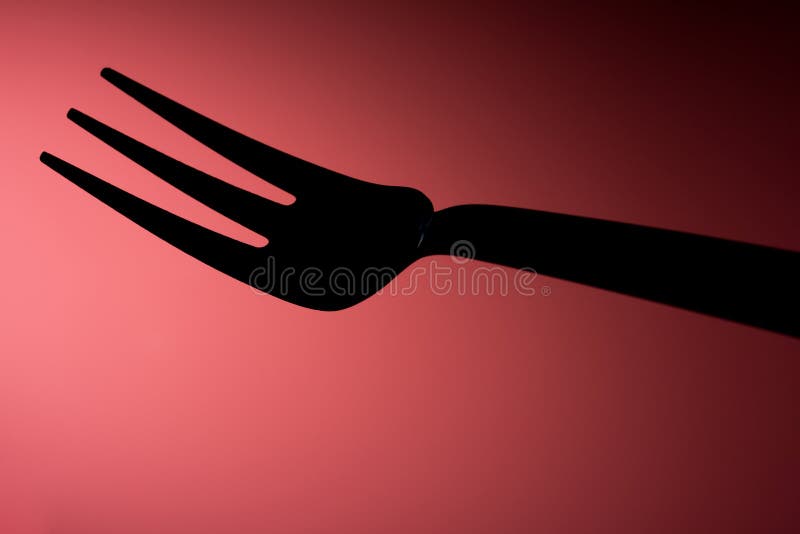 Fork Silhouette in Red Background in Studio Stock Image - Image of ...