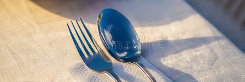Fork and Spoon with Reflection of Clouds. Dinner in the Open Air ...