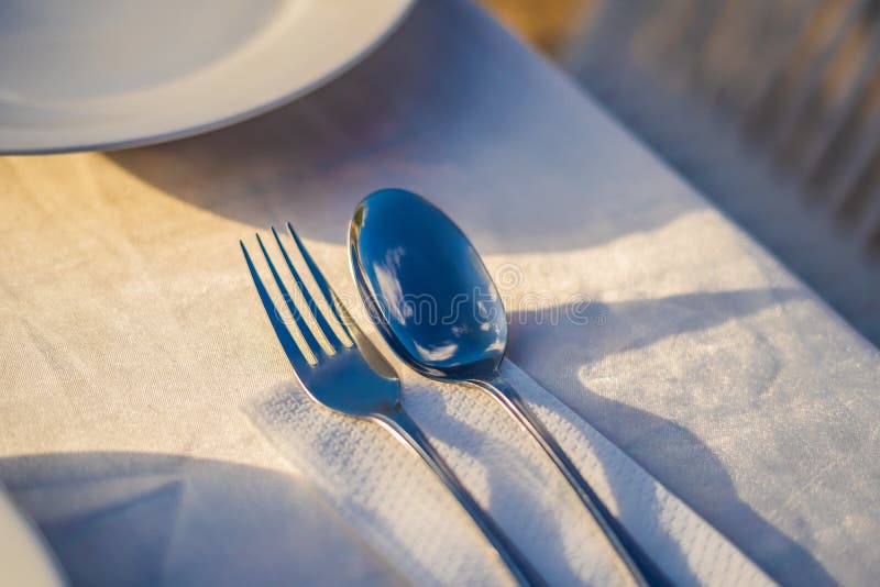 Fork and Spoon with Reflection of Clouds. Dinner in the Open Air Stock ...