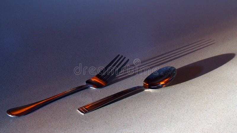 Fork and Spoon with Shadows Stock Image - Image of golden, long: 36539155