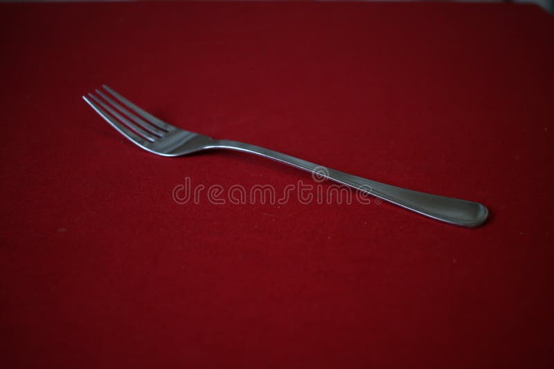 Fork on a table stock image. Image of utensil, pleasure - 129681601