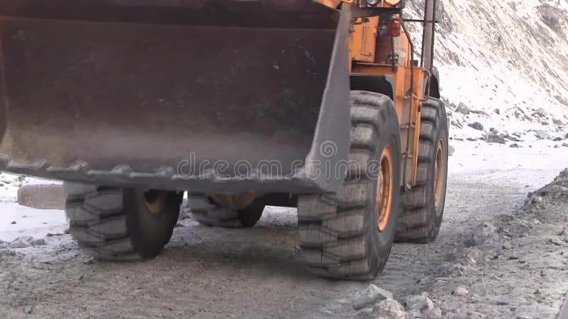 A Tractor with a Bucket is Going on a Career. Stock Footage - Video of ...