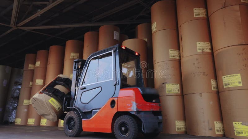 Loader at the Wallpaper Factory. the Forklift is Carrying a Large Roll ...