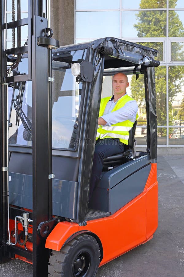 Bald Forklift Driver stock image. Image of cargo, industrial - 110581117