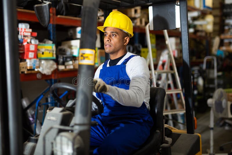 Forklift Driver Driving at Hardware Store Stock Photo - Image of ...
