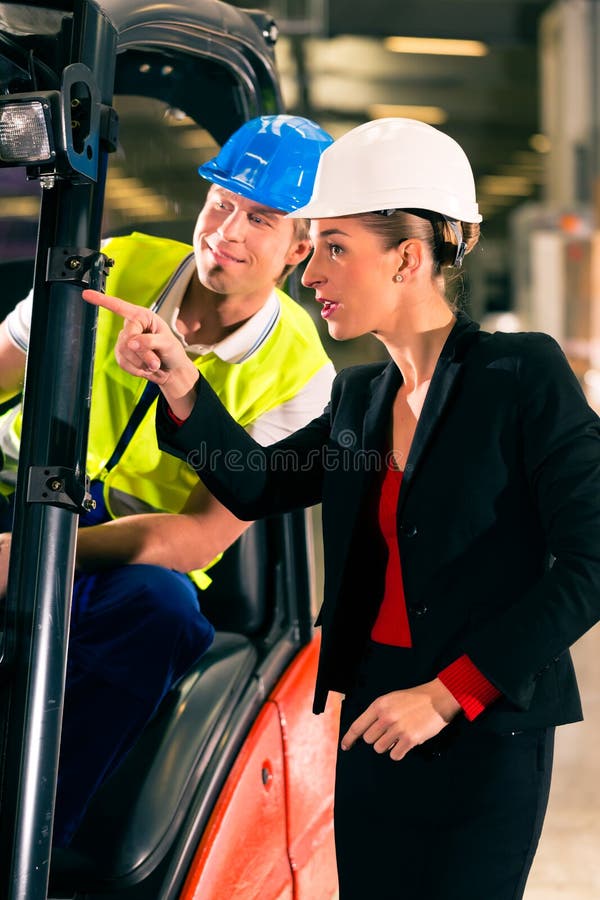 Forklift Driver and Supervisor at Warehouse Stock Image - Image of ...