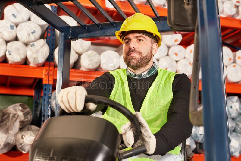 Forklift Driver Transports Cargo in Warehouse Stock Photo - Image of ...