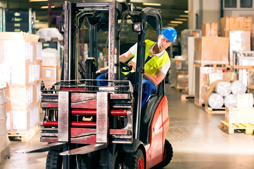 Forklift Driver at Warehouse of Forwarding Stock Photo - Image of ...