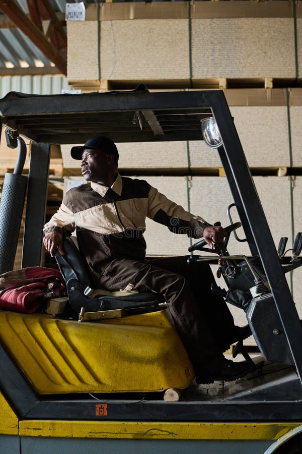 Forklift Driver Working in Industrial Factory Stock Photo - Image of ...