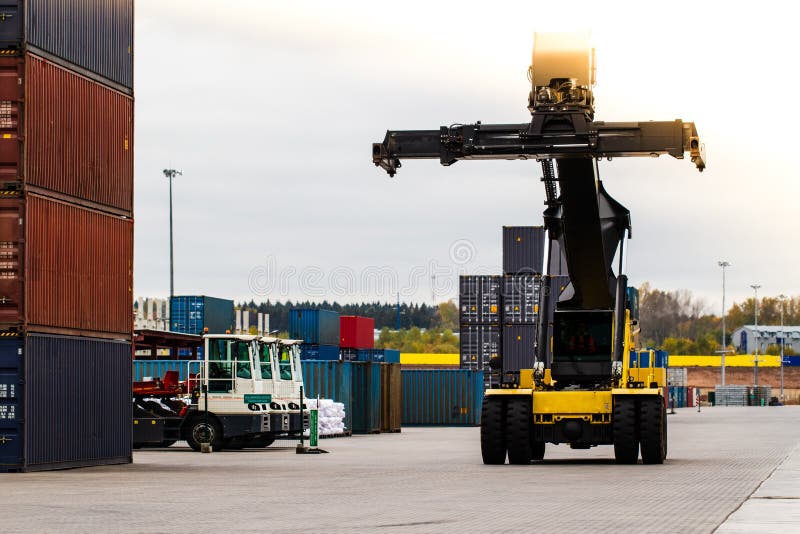 Forklift Handling Cargo Container. Freight Container Loading Stock ...