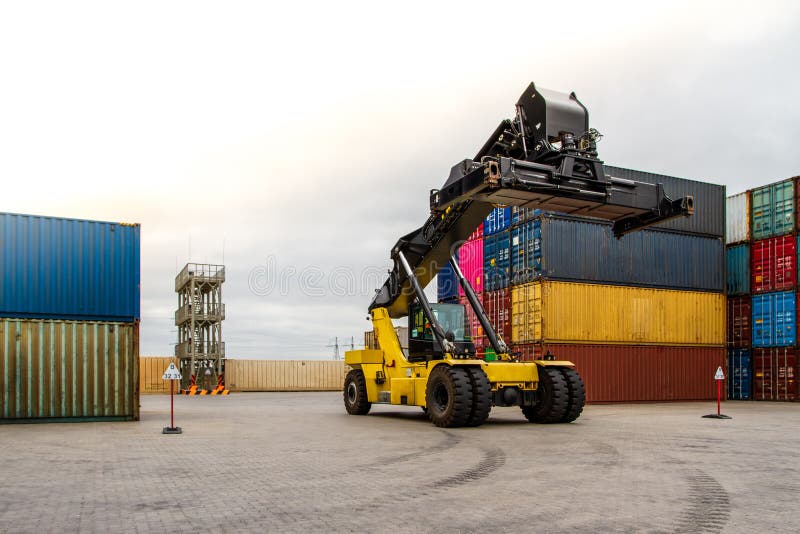 Forklift Handling Cargo Container. Freight Container Loading Stock ...