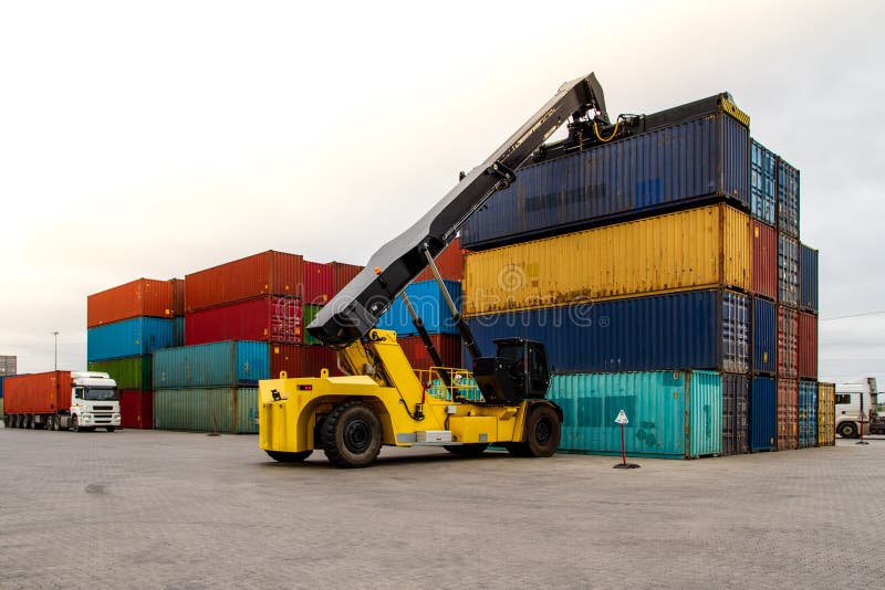 Forklift Handling Cargo Container. Freight Container Loading Stock ...