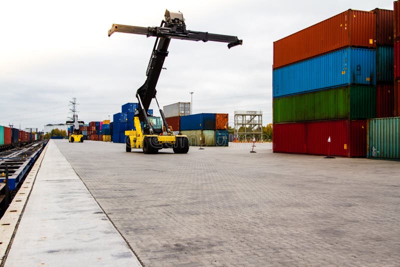Forklift Handling Cargo Container. Freight Container Loading Stock ...