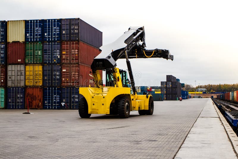 Forklift Handling Cargo Container. Freight Container Loading Stock ...