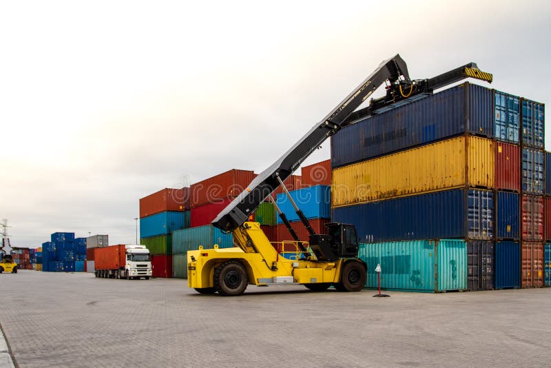 Forklift Handling Cargo Container. Freight Container Loading Stock ...
