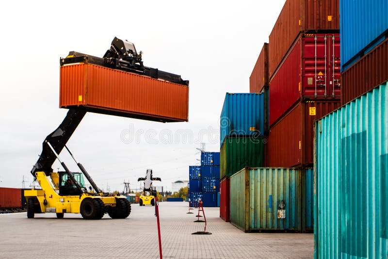 Forklift Handling Cargo Container. Freight Container Loading Stock ...