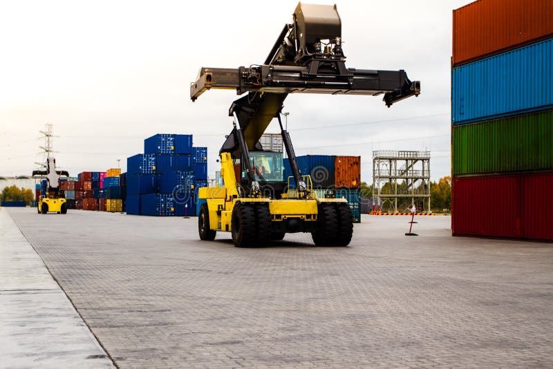 Forklift Handling Cargo Container. Freight Container Loading Stock ...