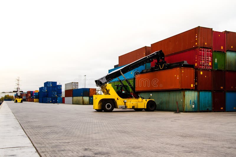 Forklift Handling Cargo Container. Freight Container Loading Stock ...